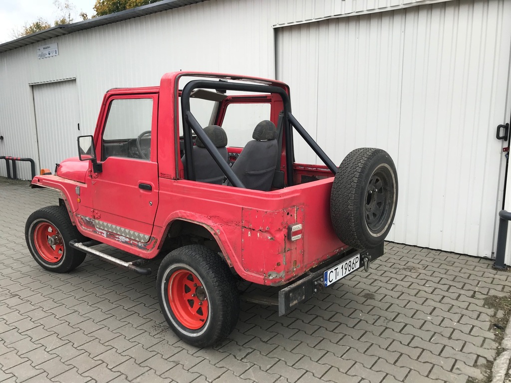 KIA ROCSTA 1996 rok WRANGLER - 7040011331 - oficjalne archiwum Allegro